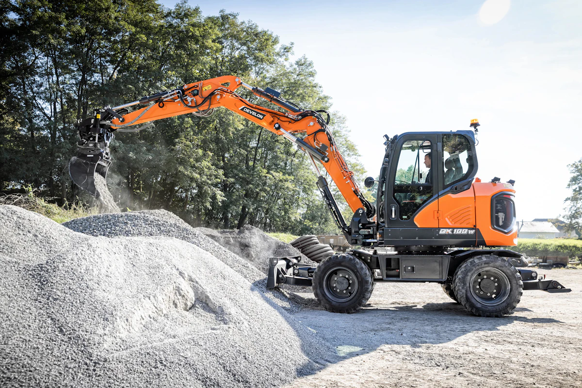 Develon Intros DX100W-7 Mini Wheel Excavator From: DEVELON North ...
